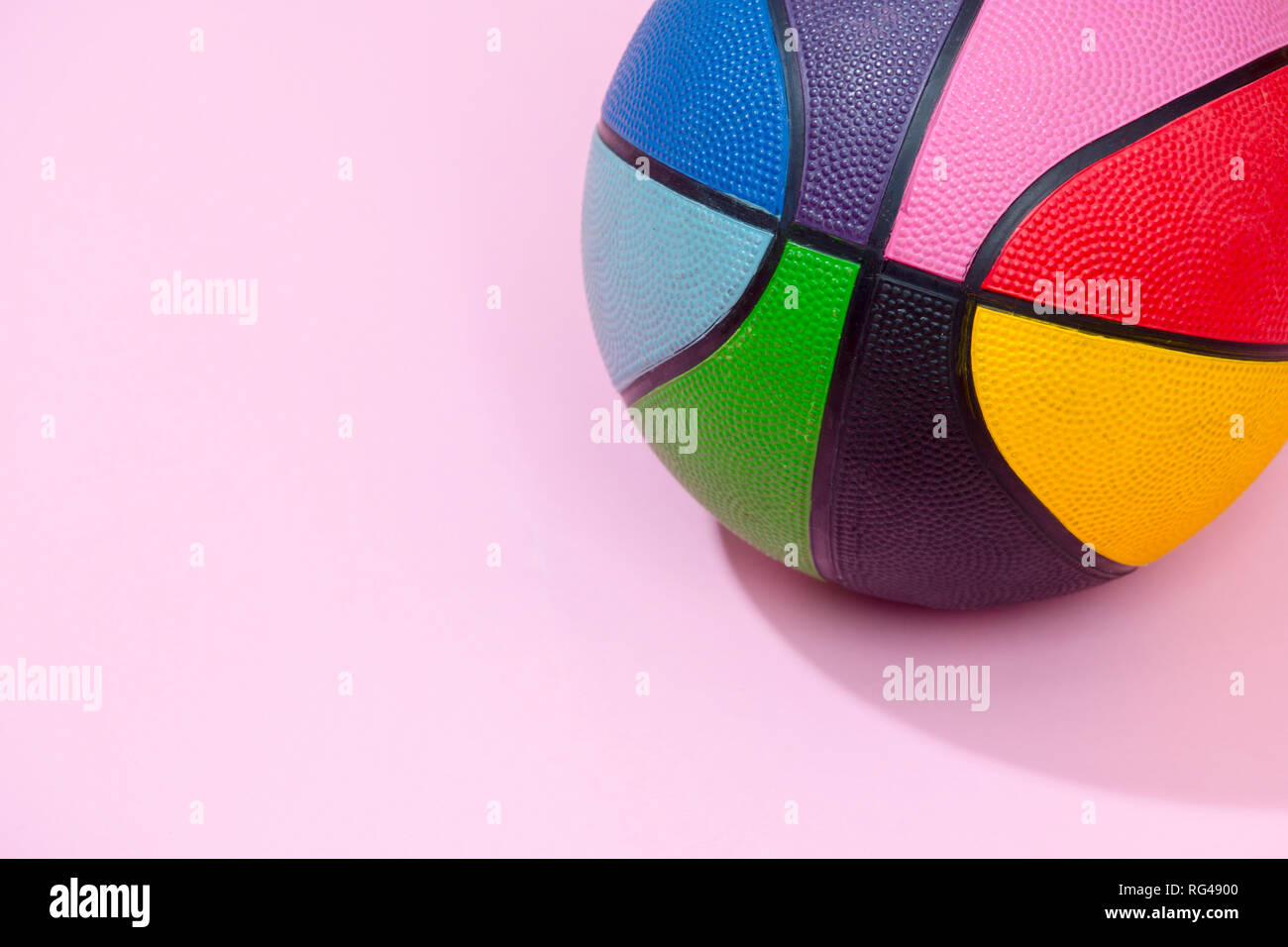 Basketball on pink background as a sports and fitness symbol of a team ...