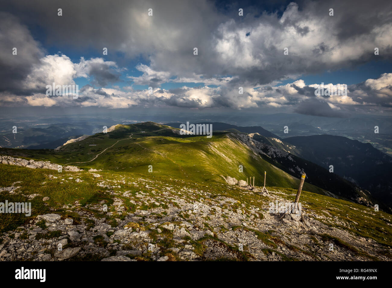 Rocky path and grassy rax plateau on hike Dambocksteig from Schneeberg ...