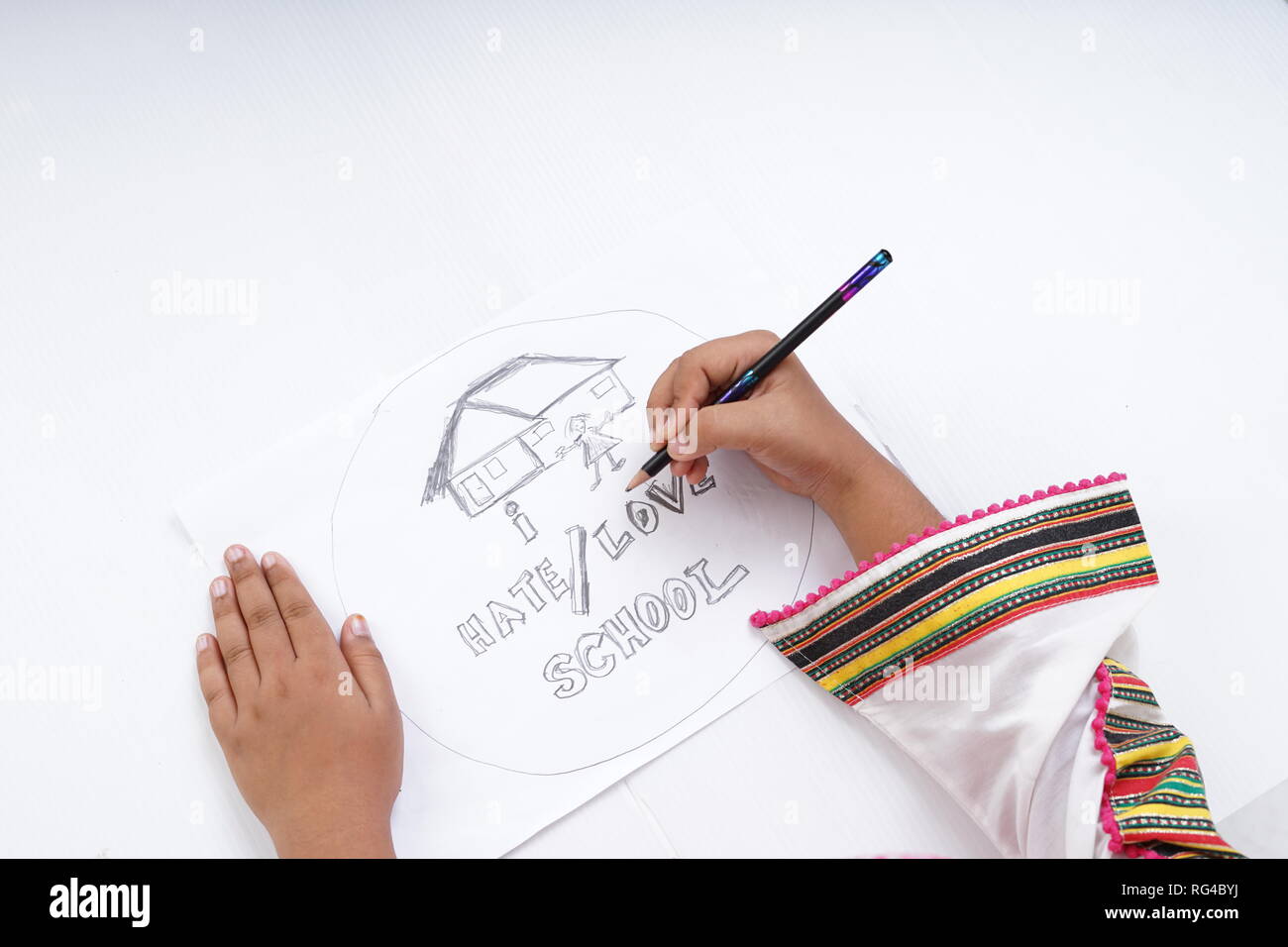 School Girl hands Drawing and writing on papper Stock Photo - Alamy