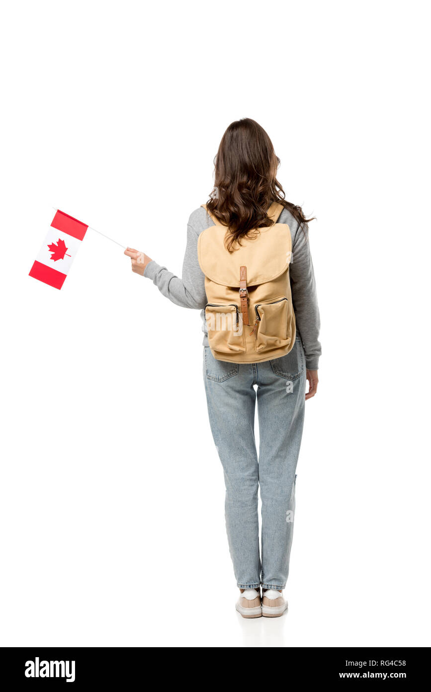 back view of female student with canadian flag and backpack isolated on ...