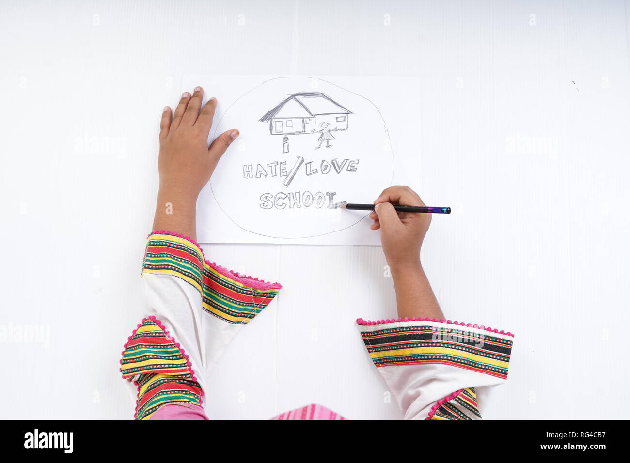School Girl hands Drawing and writing on papper Stock Photo - Alamy