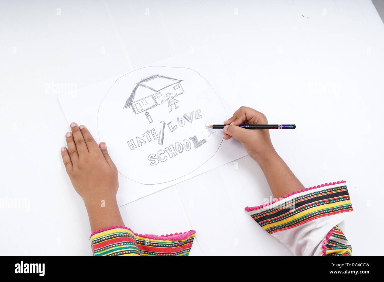School Girl hands Drawing and writing on papper Stock Photo - Alamy