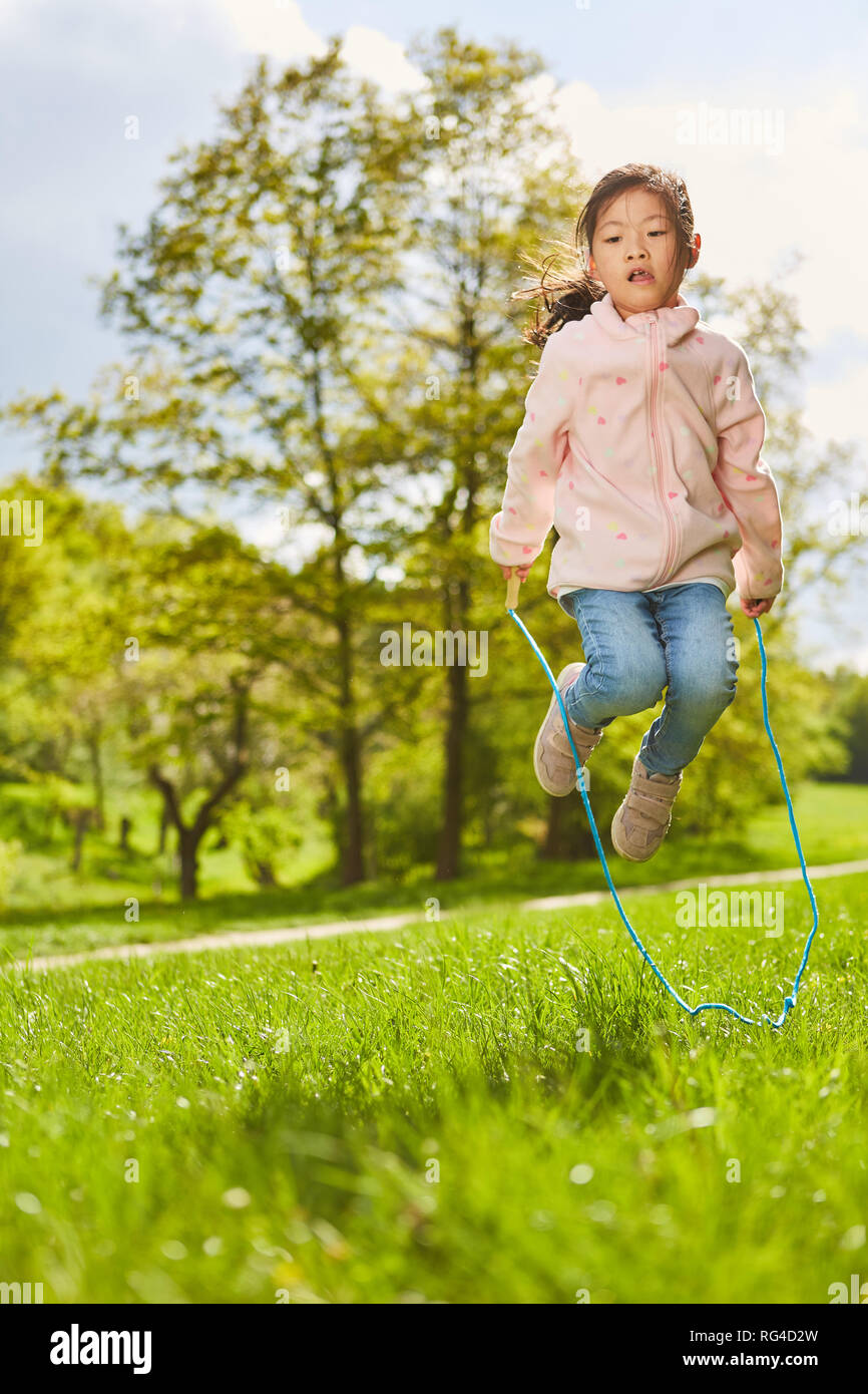 Child girl skipping rope hi-res stock photography and images - Alamy
