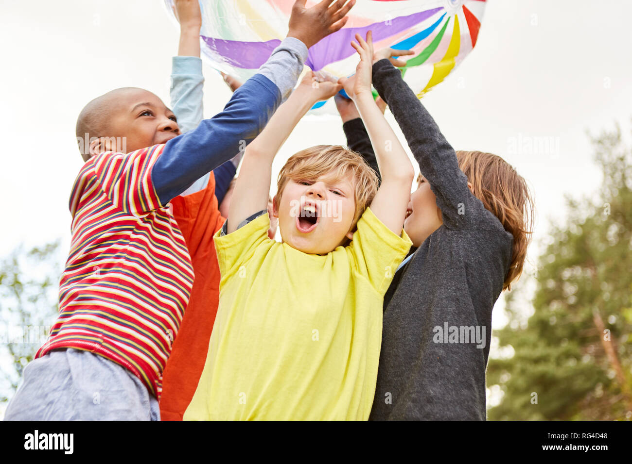 Children are happy and cheer as winners in a competition with a ...