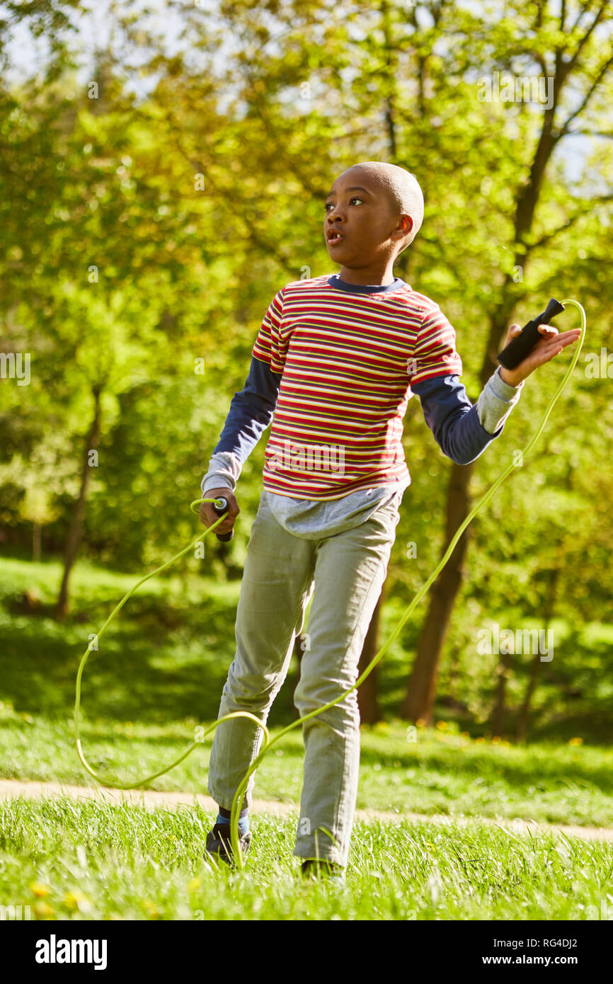 Boy skipping rope hi-res stock photography and images - Alamy