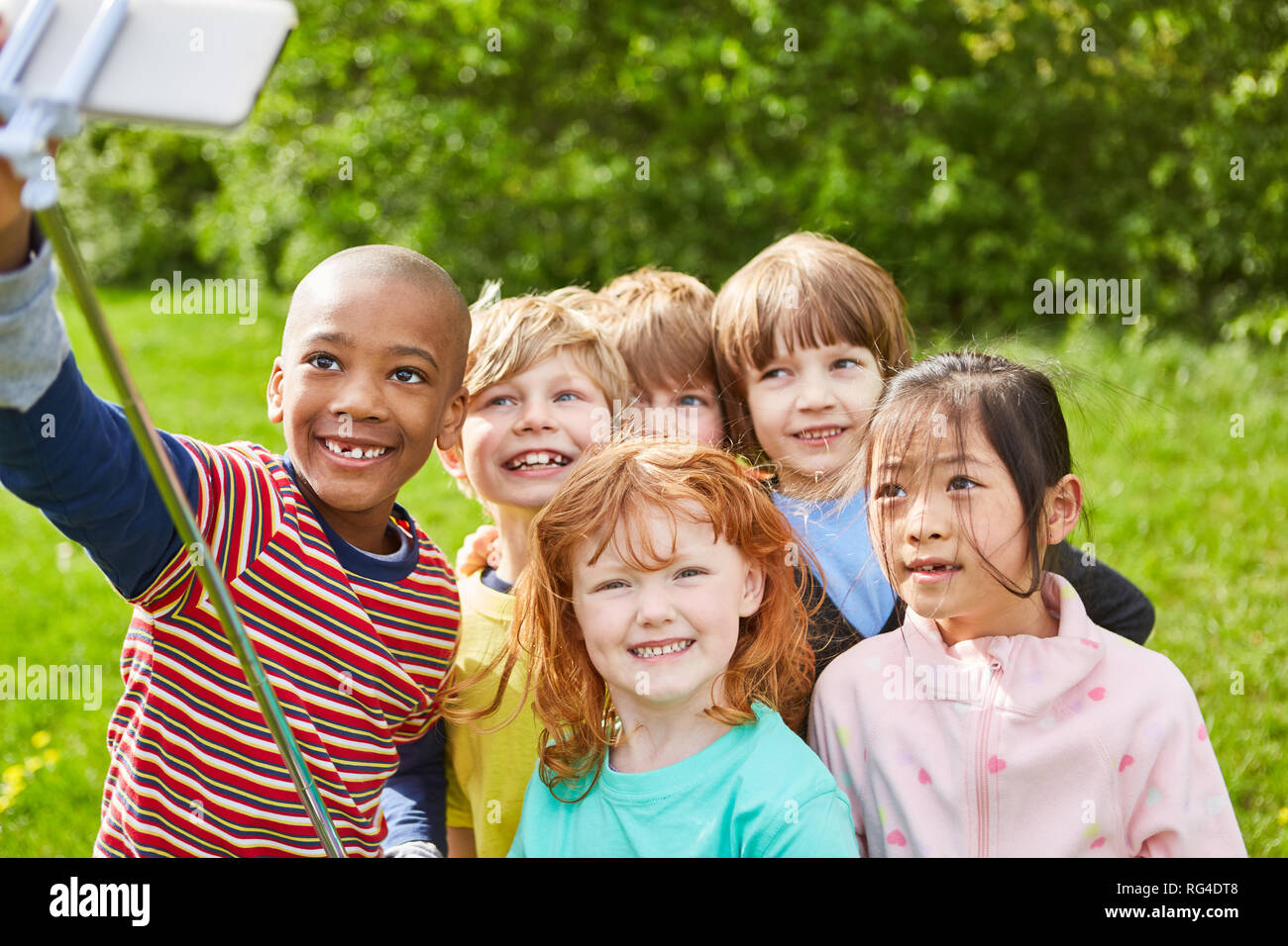 Children take a selfie photo as a memory of the kindergarten or summer ...