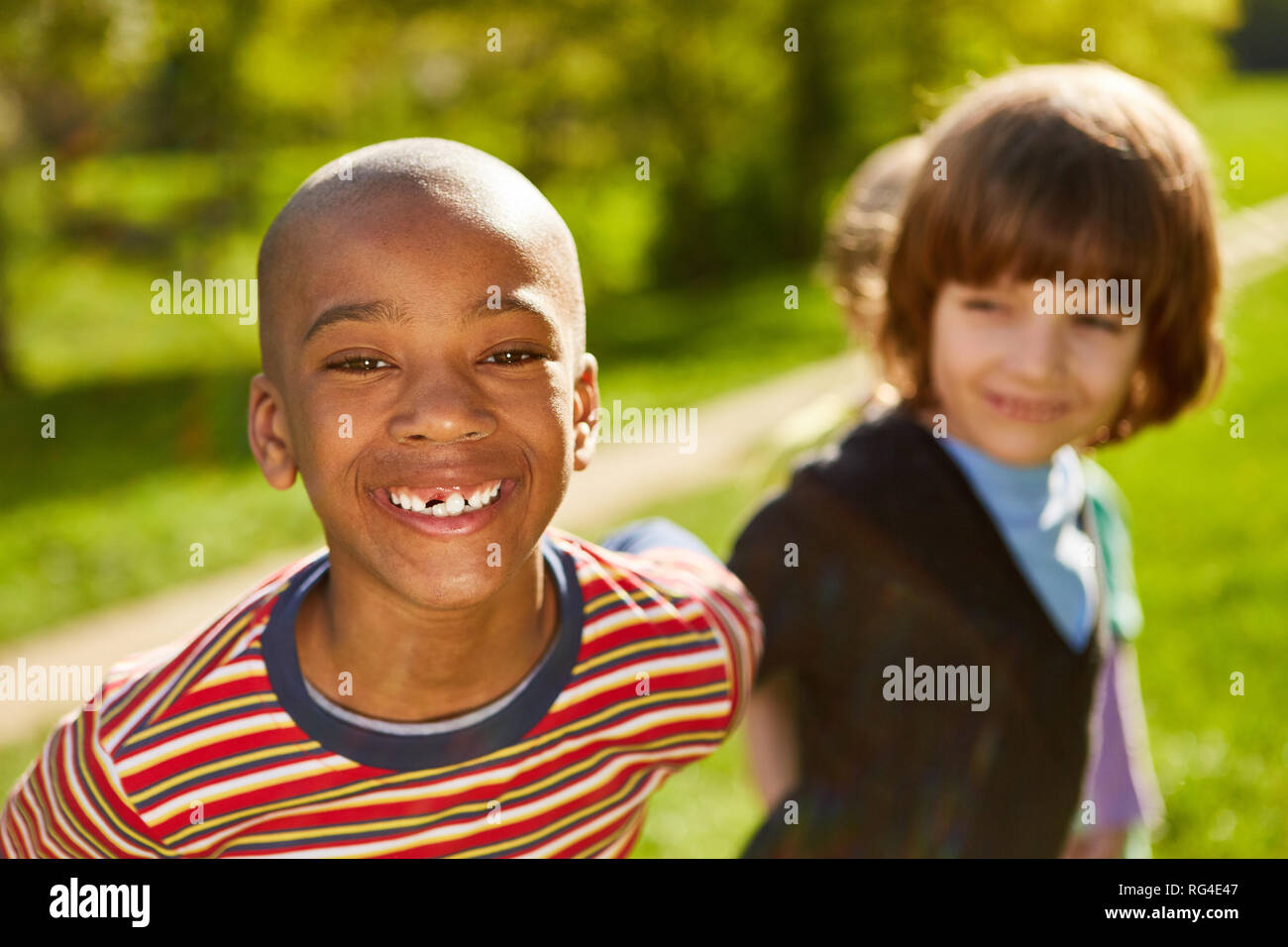 Young happy african boy hi-res stock photography and images - Alamy