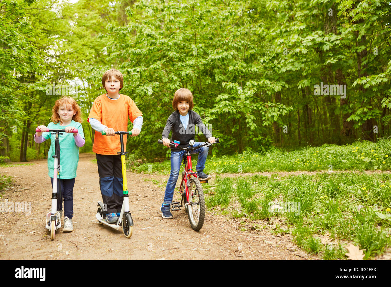 Three friends cycling hi-res stock photography and images - Alamy