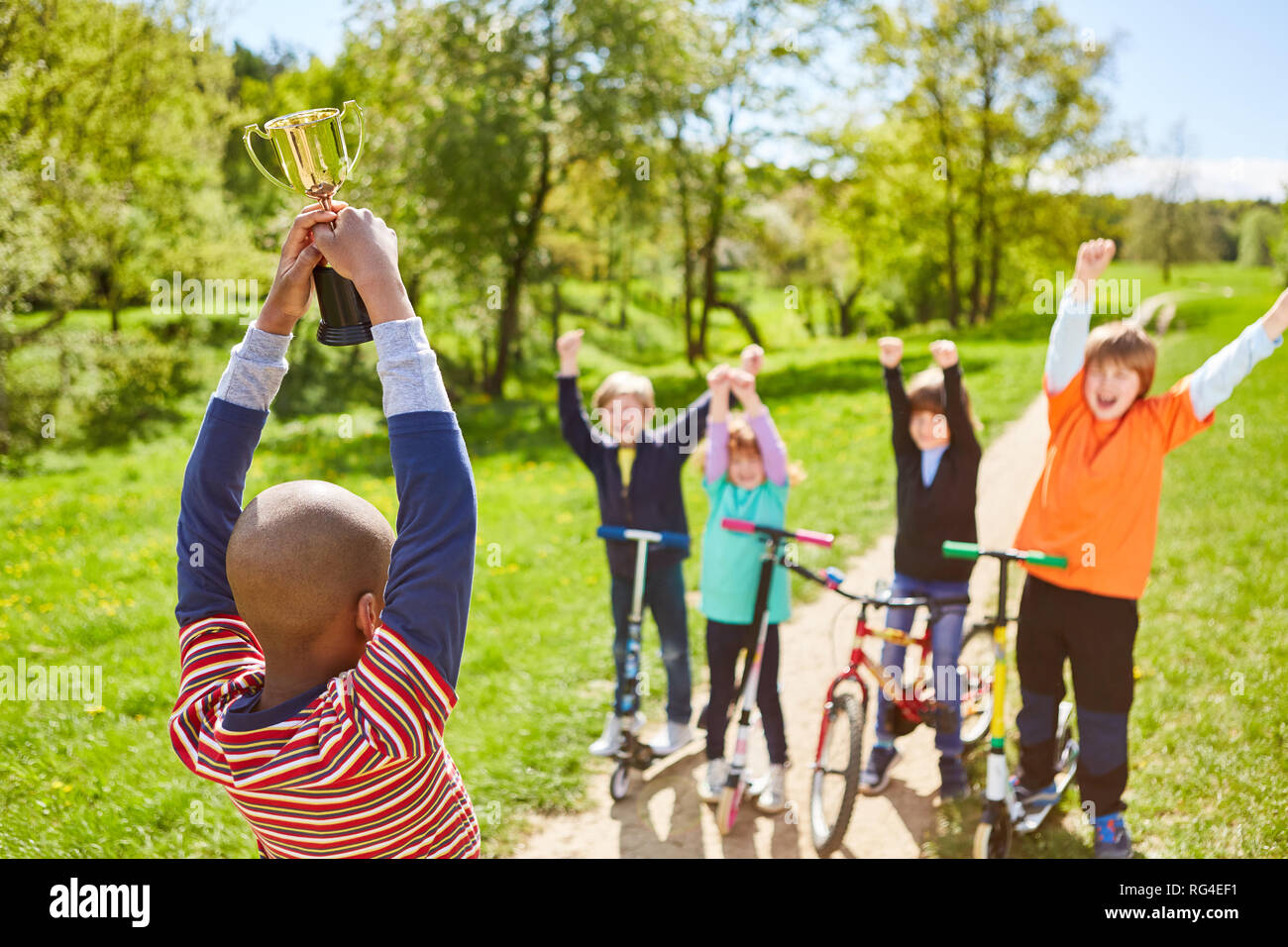Children team winners hi-res stock photography and images - Alamy