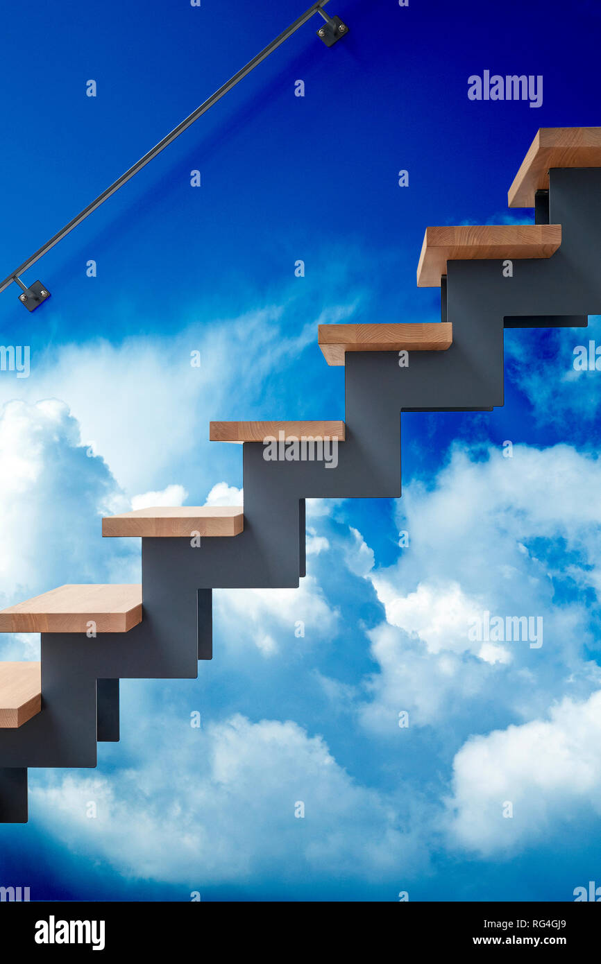 Hardwood stairs in modern living room against cloudy sky wall ...