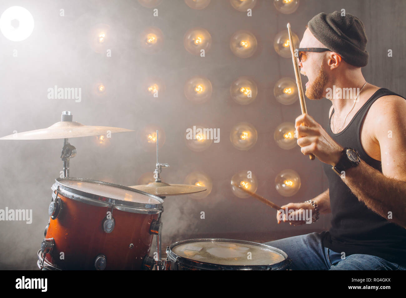 awesome man is playing rock music at club Stock Photo - Alamy