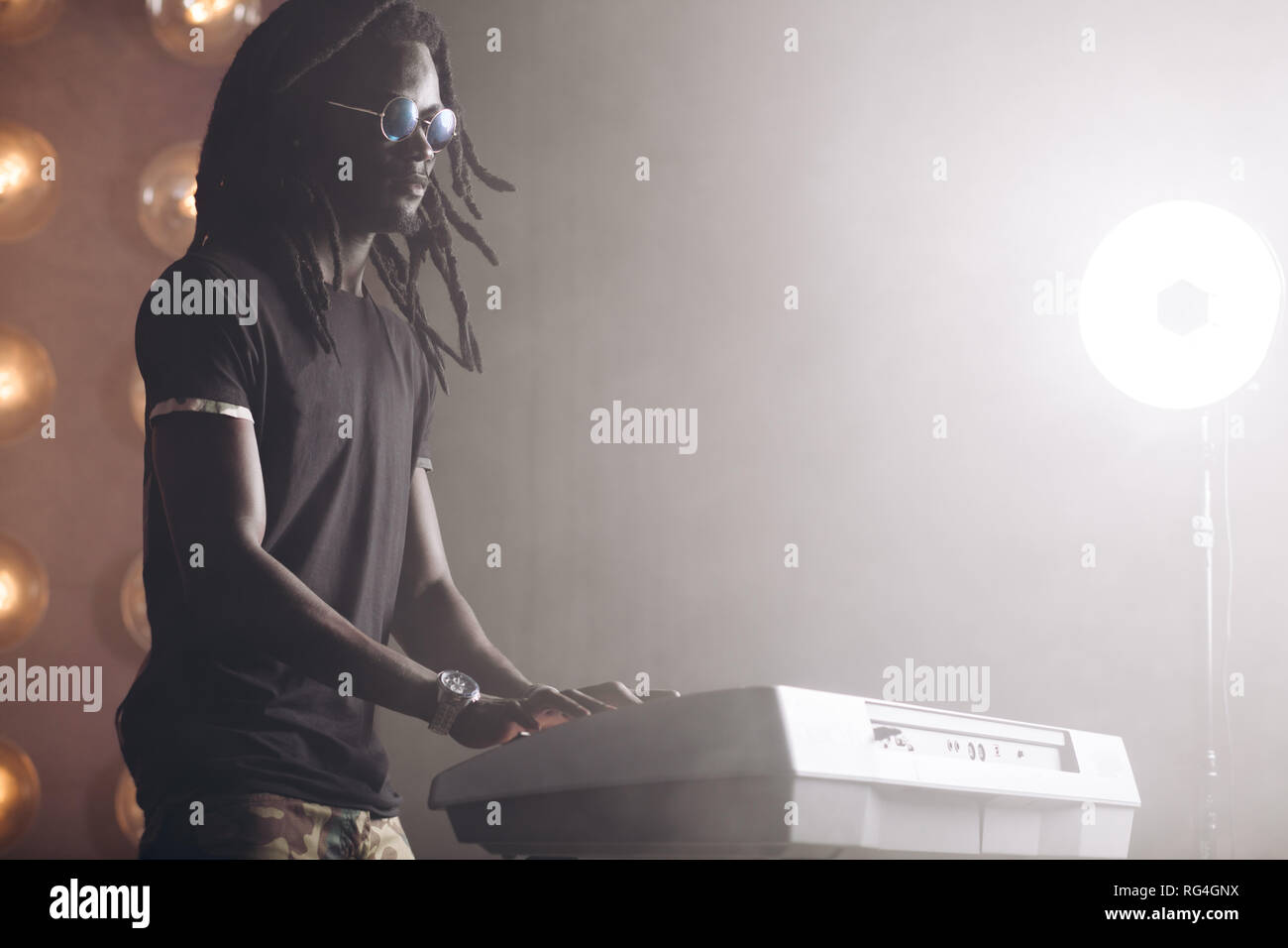 blind musician playing the musical keyboard Stock Photo - Alamy