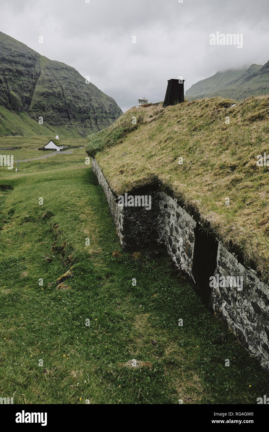 A turfed roof farm house in Saksun a village near the northwest coast ...