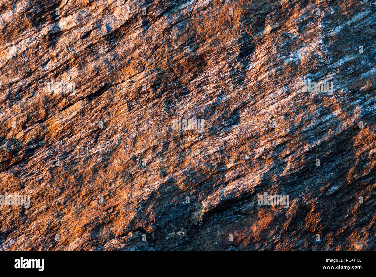 Beautiful rock texture in late sunset light Stock Photo - Alamy