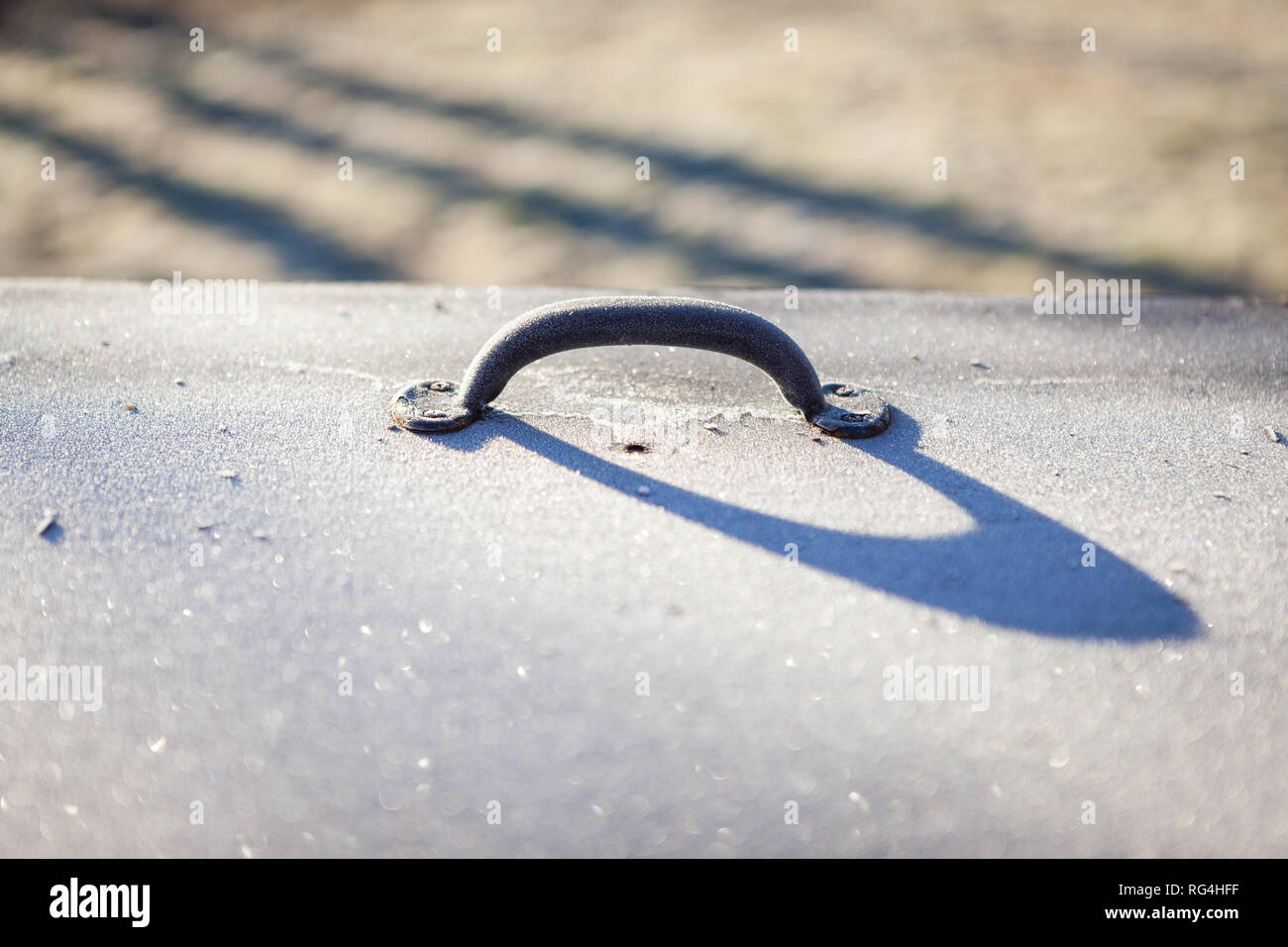 Handle on storage container outdoors Stock Photo - Alamy