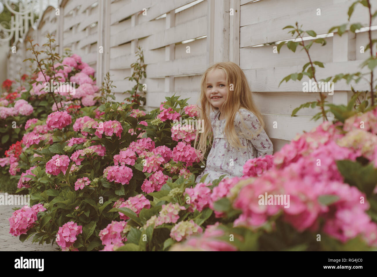 Spring flowers. Childhood. Childrens day. Small baby girl. New life ...