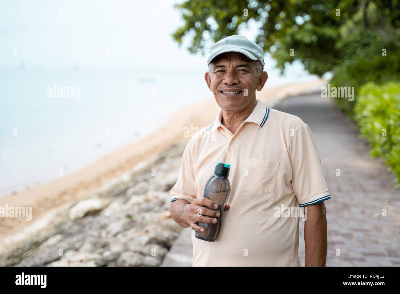 Asian senior male jogging hi-res stock photography and images - Alamy