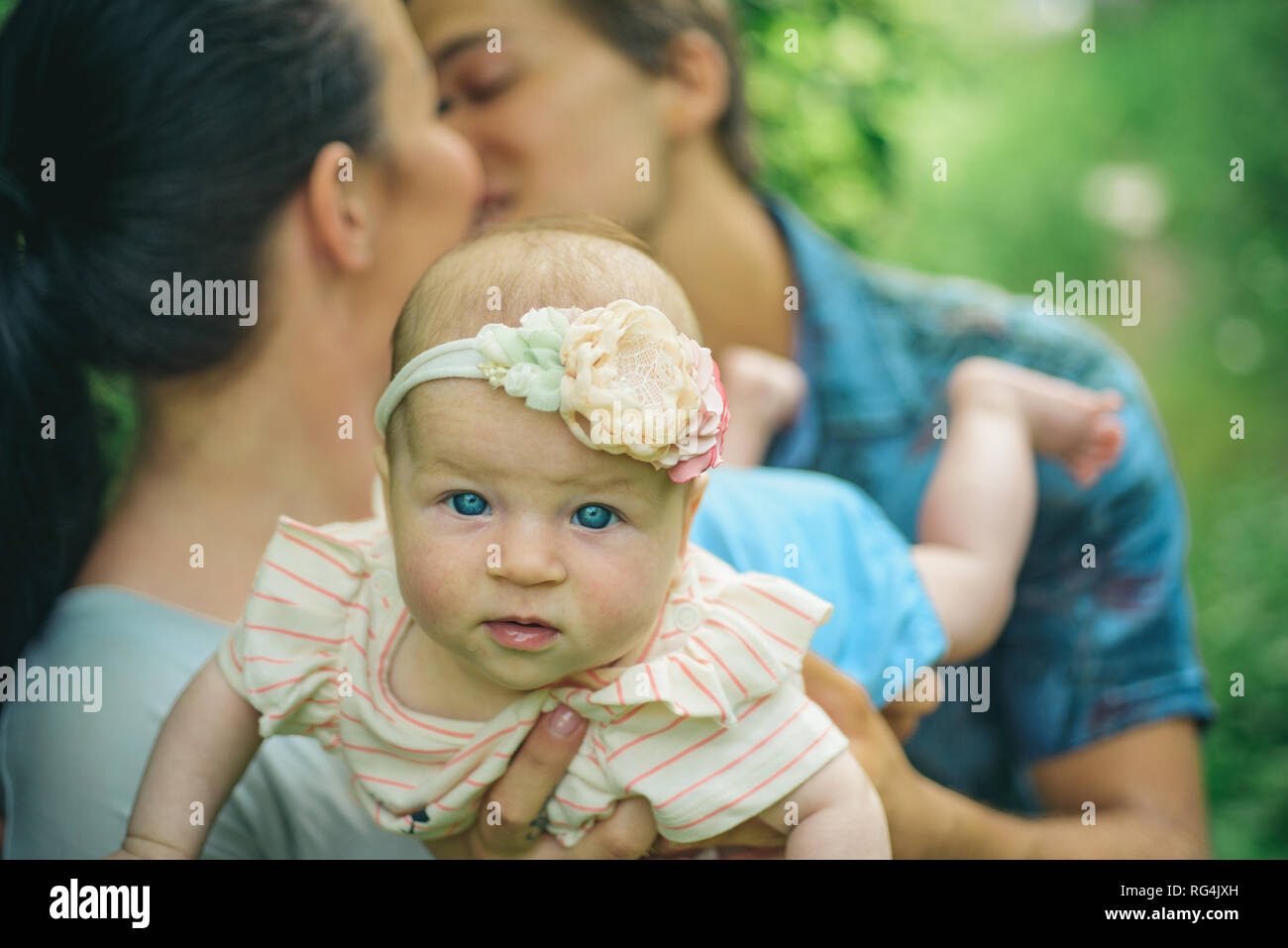 Mutual understanding between parents in family. Family love of newborn ...