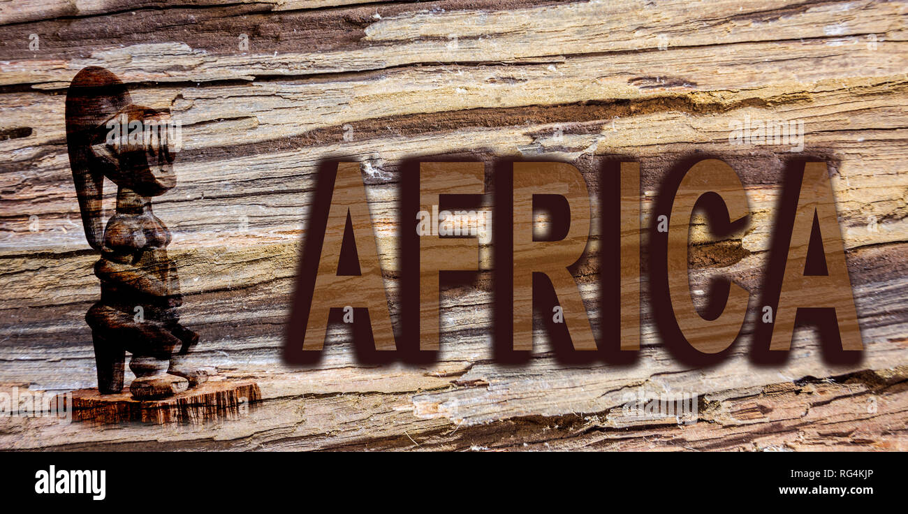 Africa sign board on old wood bark with ethnic sculpture Stock Photo ...