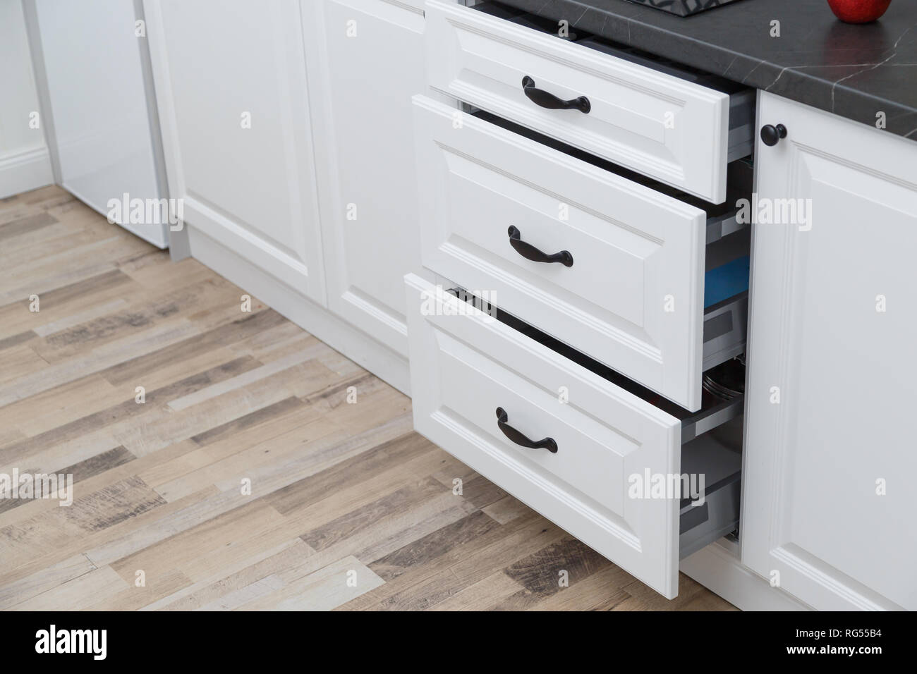 Kitchen furniture. White kitchen drawers Stock Photo - Alamy