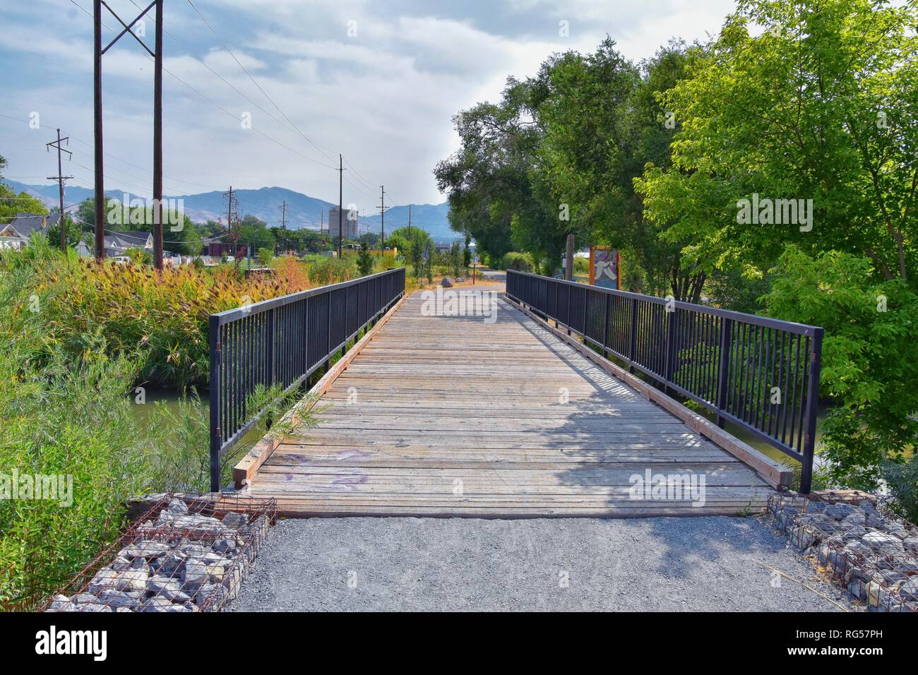 Views of Jordan River Trail Pedestrian and Train Track Bridge with ...
