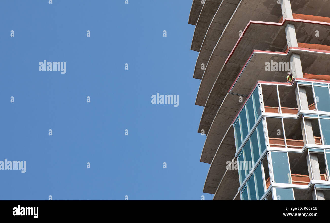 Construction of a new high rise building with a construction crew ...