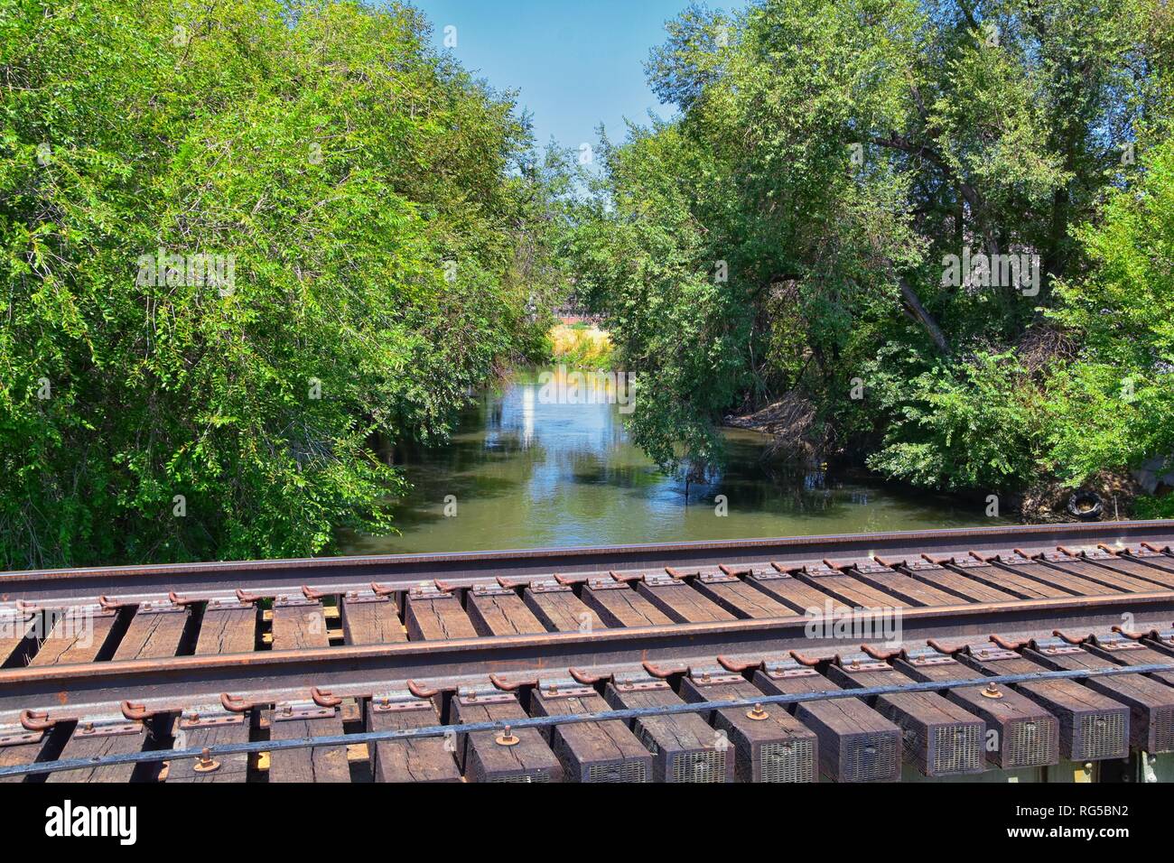 Views of Jordan River Trail Pedestrian and Train Track Bridge with ...