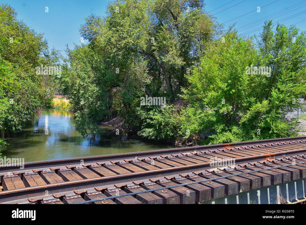 Views of Jordan River Trail Pedestrian and Train Track Bridge with ...