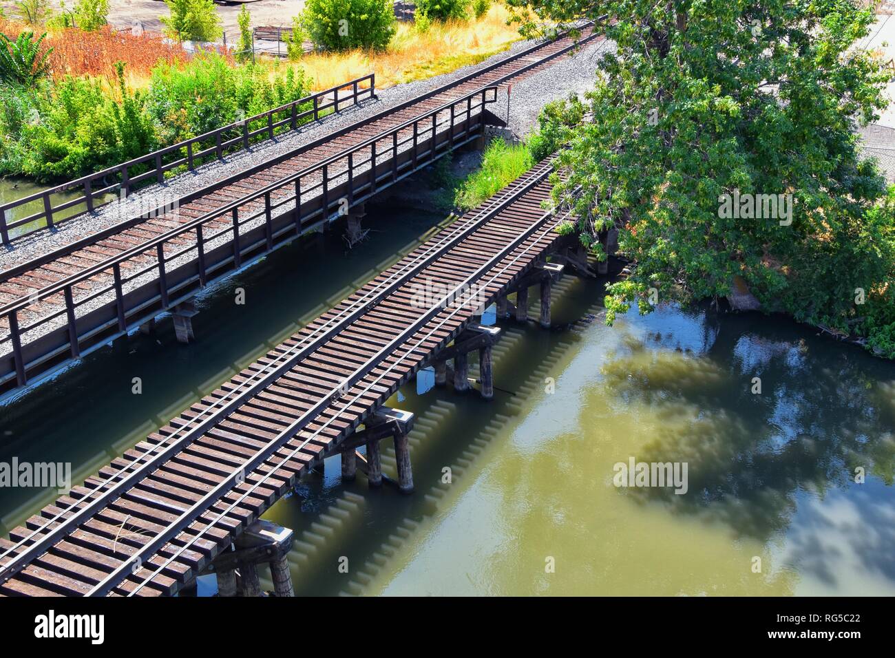 Views of Jordan River Trail Pedestrian and Train Track Bridge with ...
