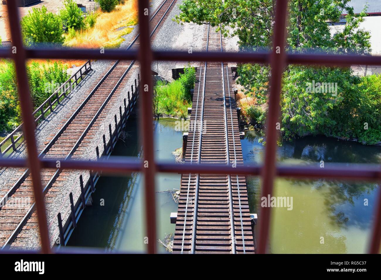 Views of Jordan River Trail Pedestrian and Train Track Bridge with ...
