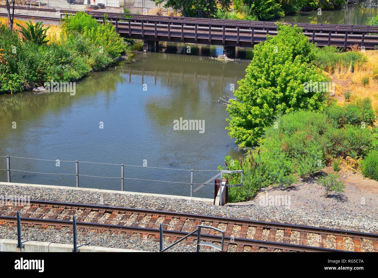 Views of Jordan River Trail Pedestrian and Train Track Bridge with ...