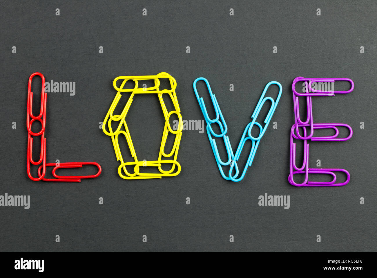 Word love made from paper clips Stock Photo - Alamy