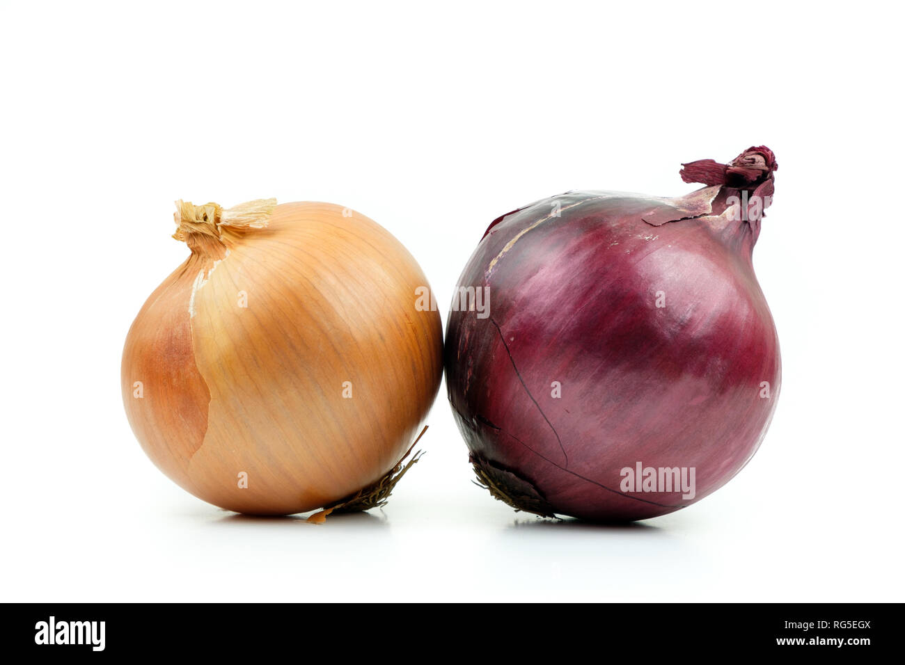 Ripe yellow and red onion on a white background Stock Photo - Alamy