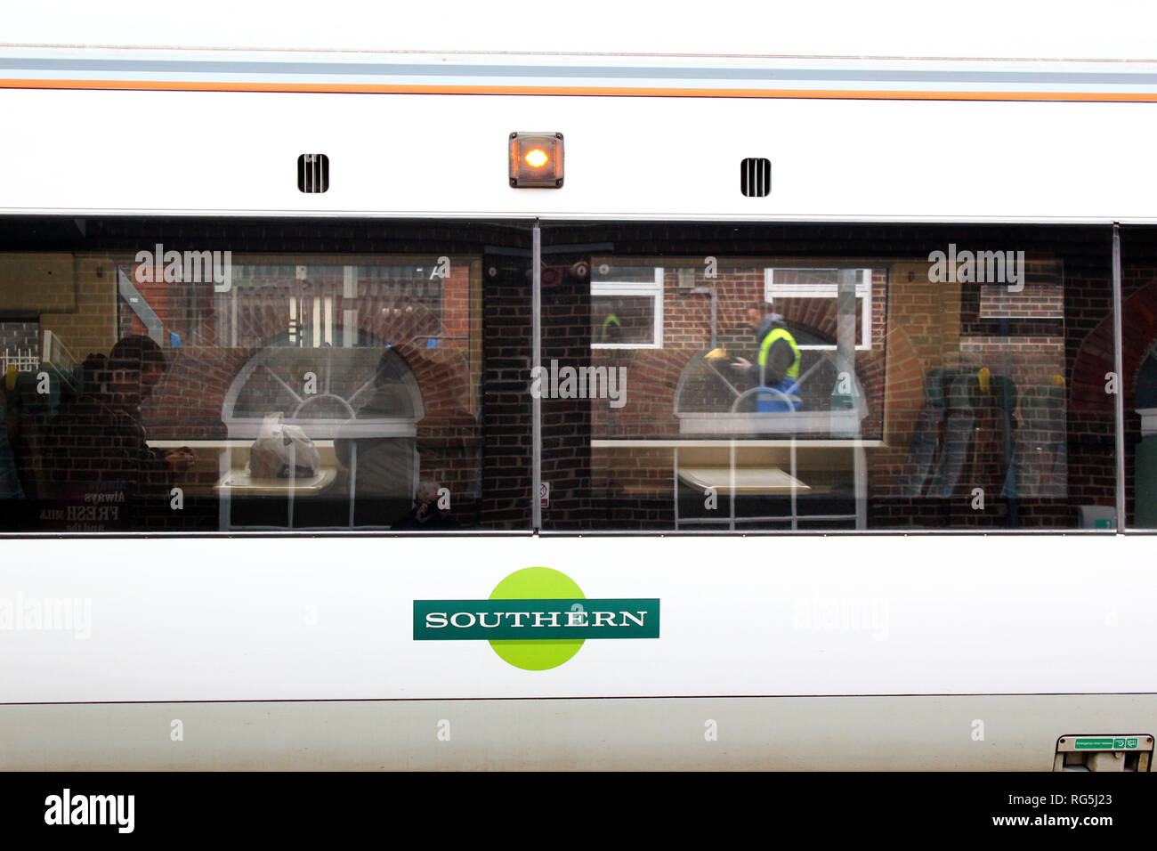 Southern train coach carriage with passengers in platform station ...