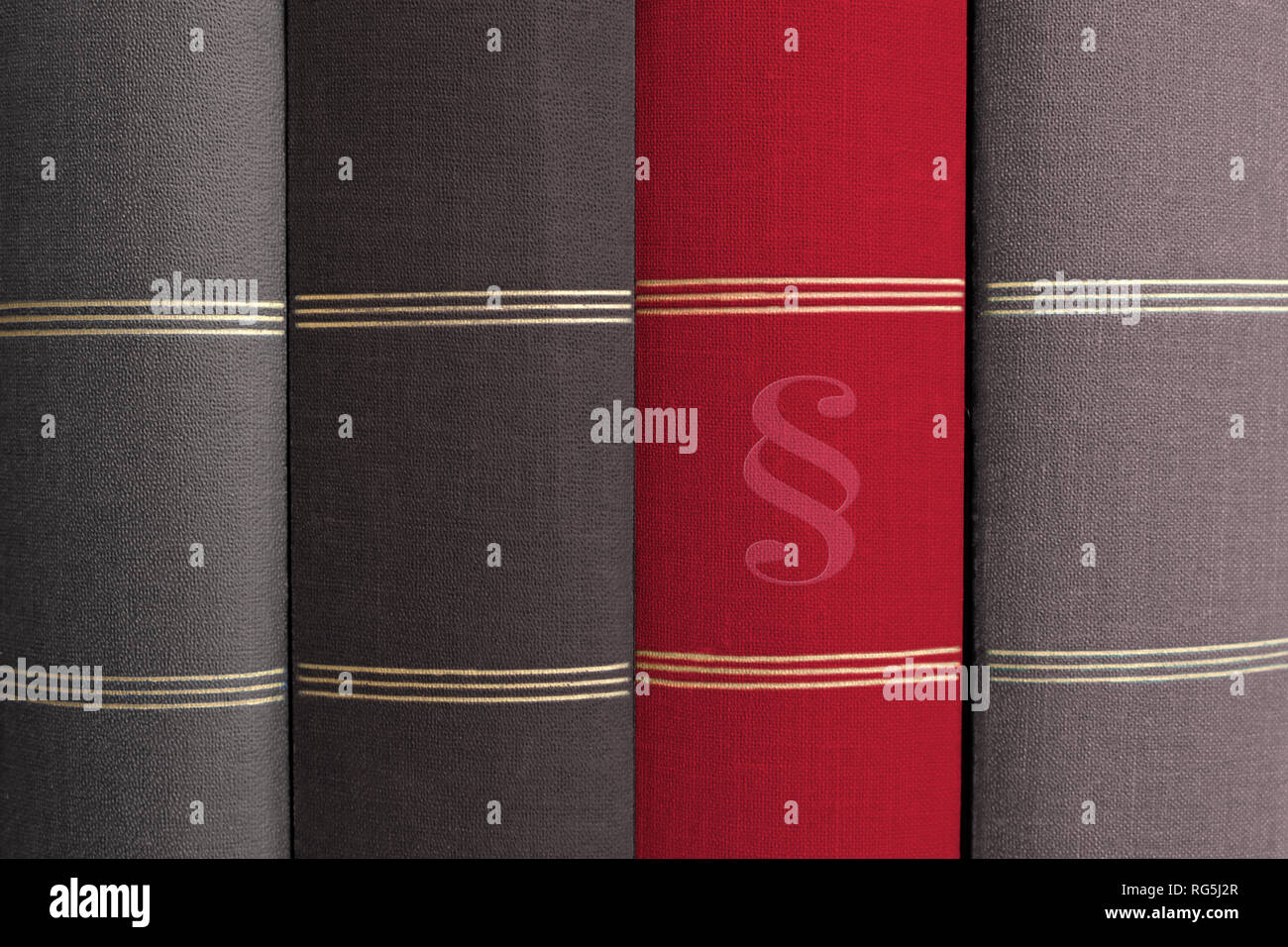 law book with paragraph symbol, between books Stock Photo - Alamy