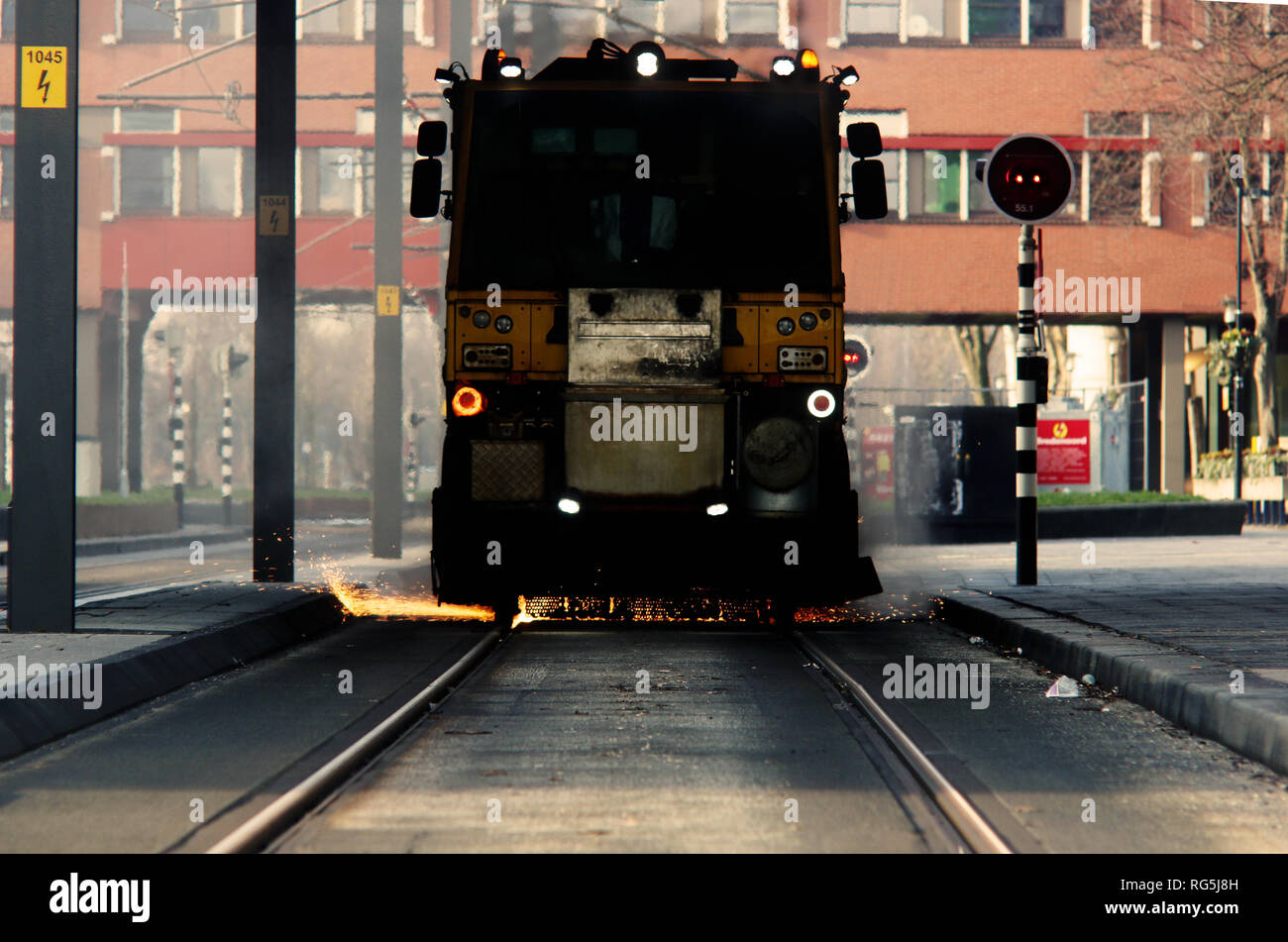 Contruction work on a tram line looks like the tram is derailing with a ...