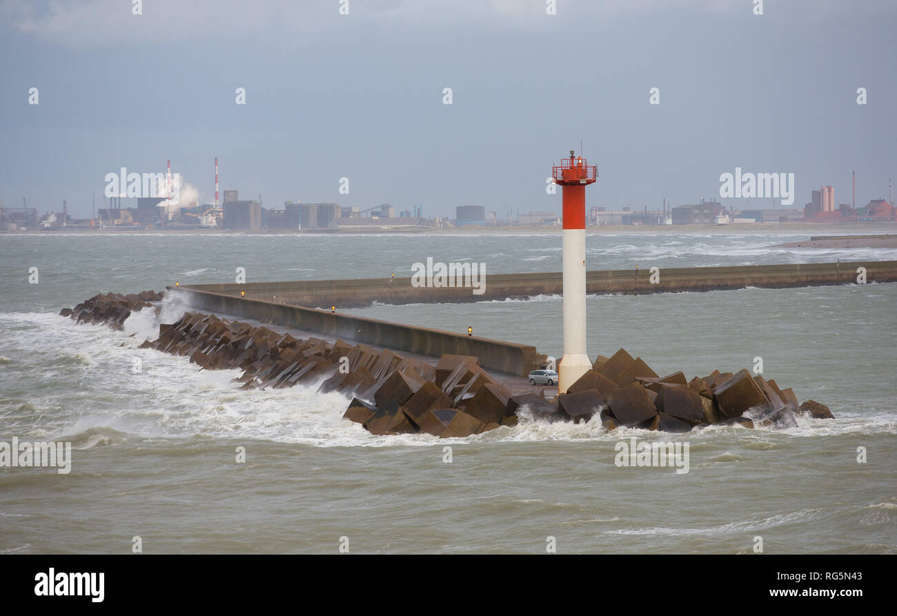 The red port channel marker and breakwater harbour wall at the entrance ...