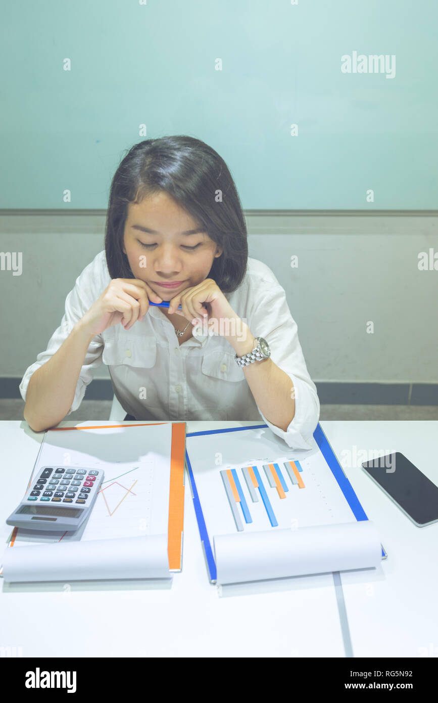 Asian lady planning report hi-res stock photography and images - Alamy
