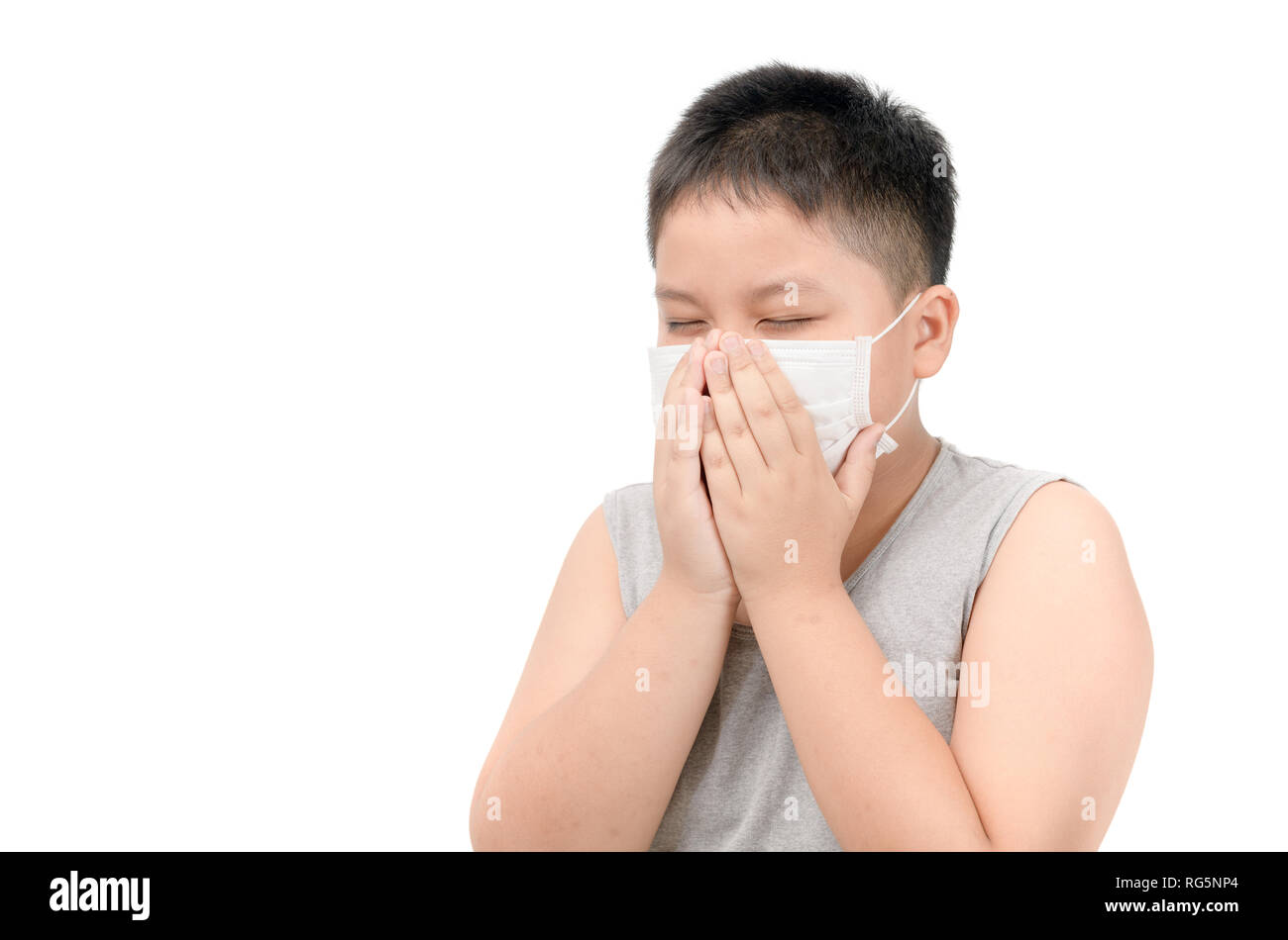 Obese fat boy wearing protective mask to protect pollution and the flu ...