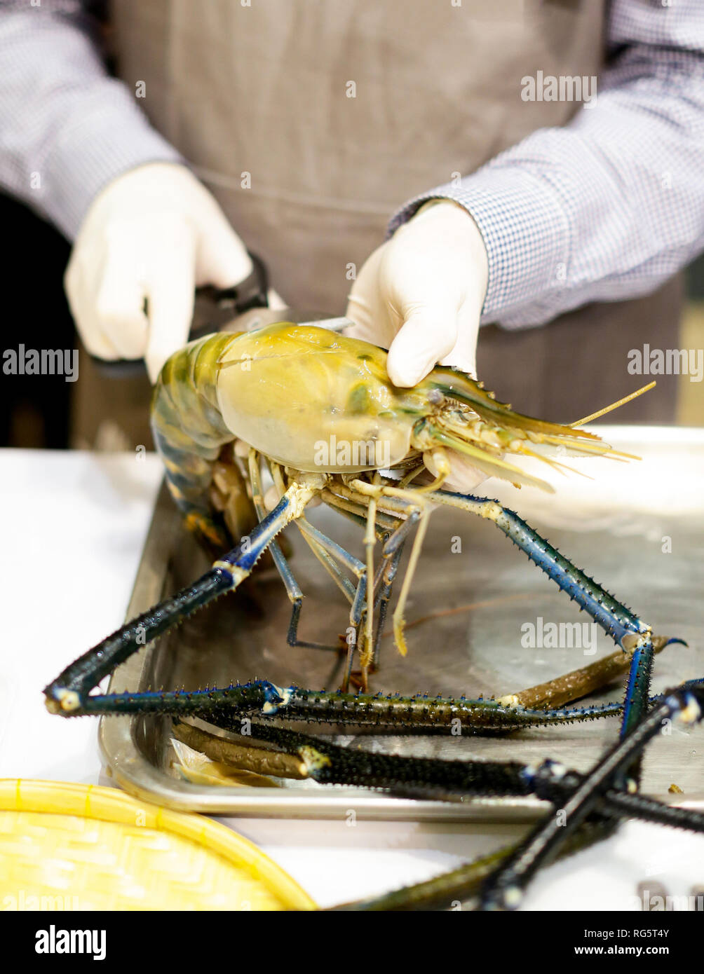 chef cooking seafood, Hand cutting raw black tiger prawn Stock Photo ...