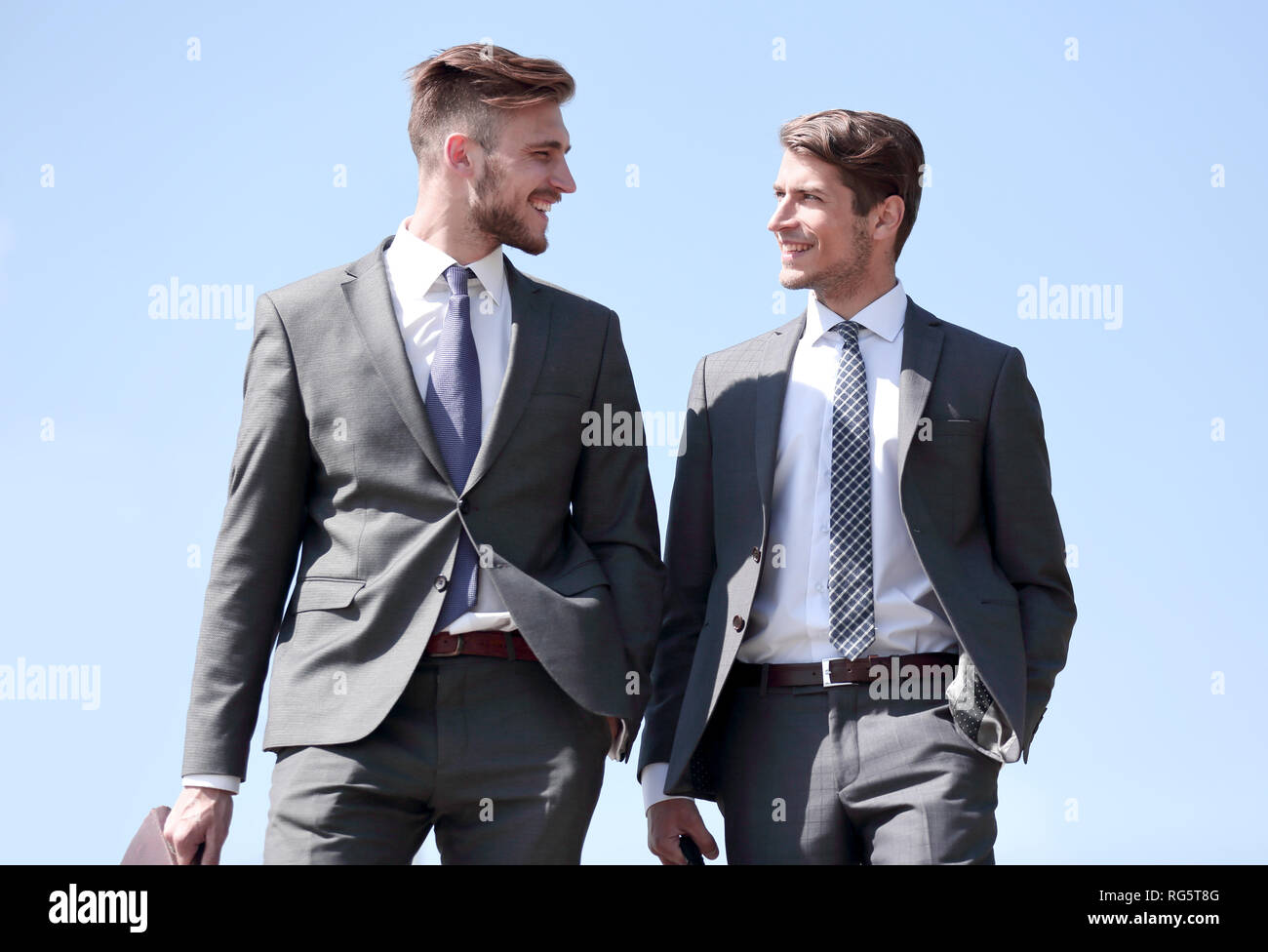 confident business partners walking together Stock Photo - Alamy
