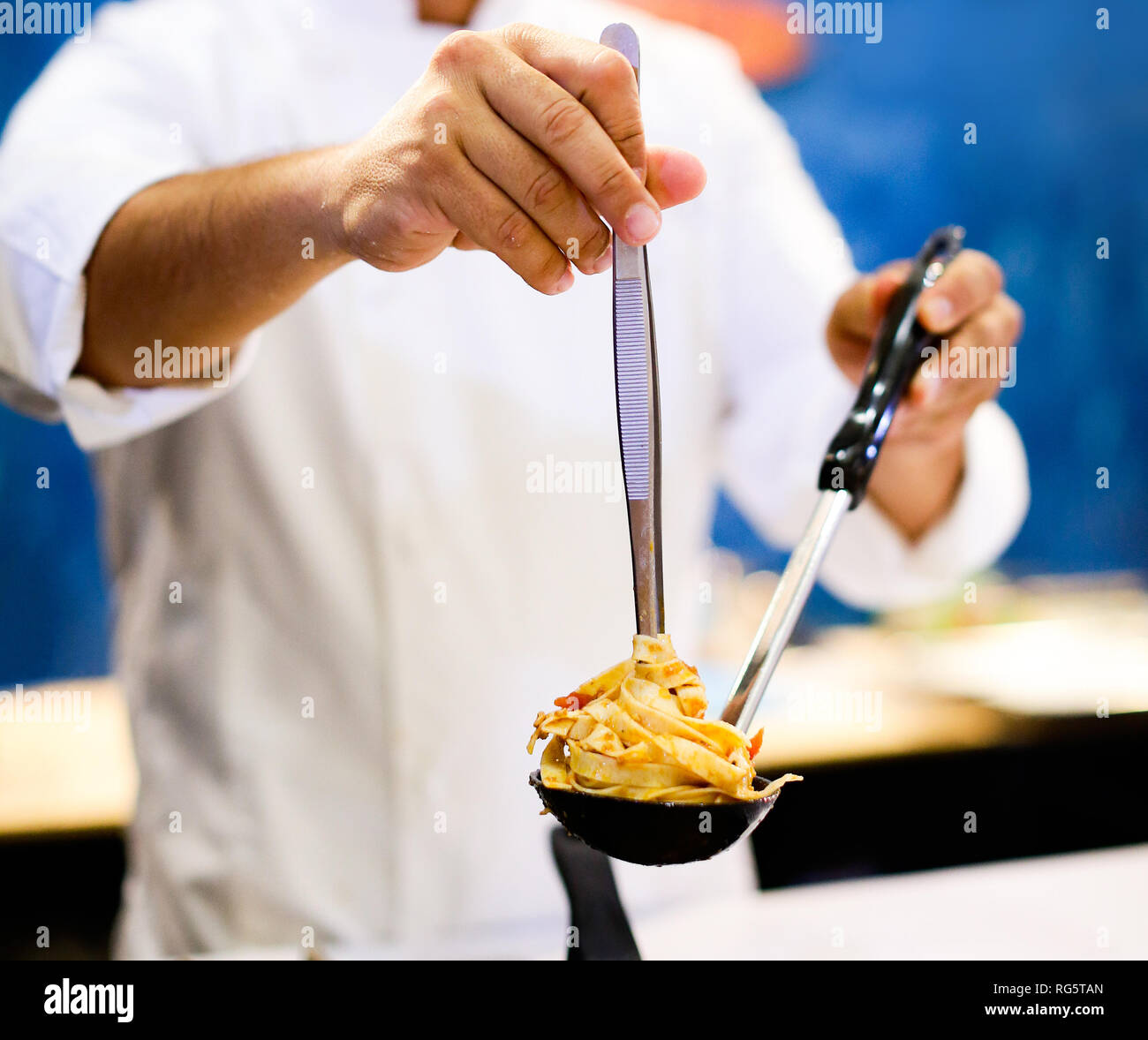 Chef cooking pasta, Chef serves spaghetti carbonara on the plate in the ...