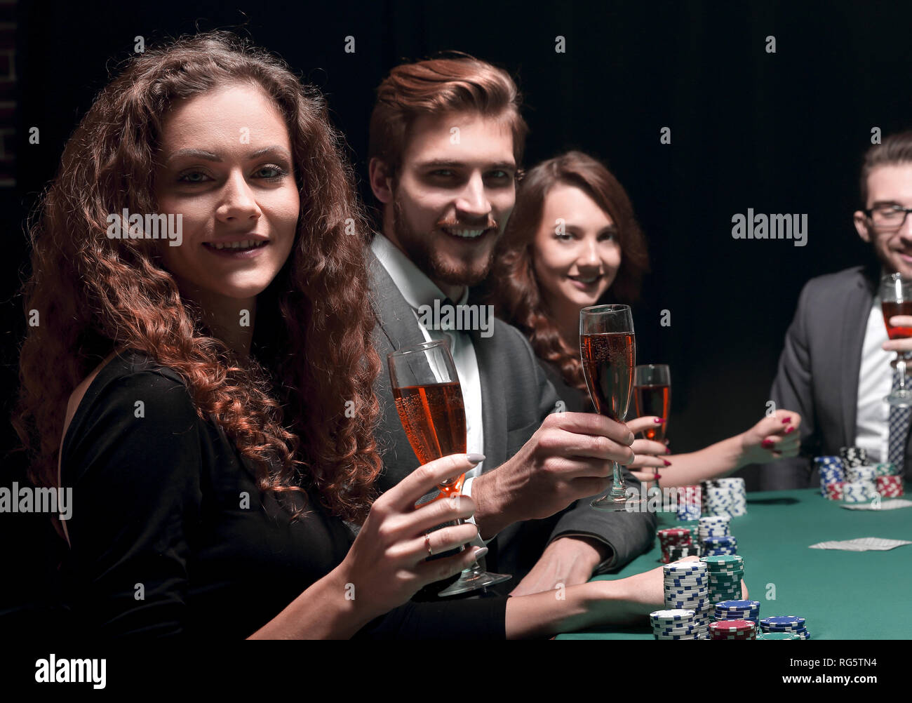 People sitting around poker table hi-res stock photography and images ...