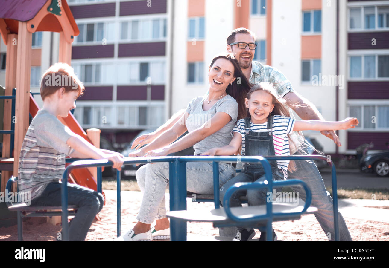 happy family on the Playground Stock Photo - Alamy