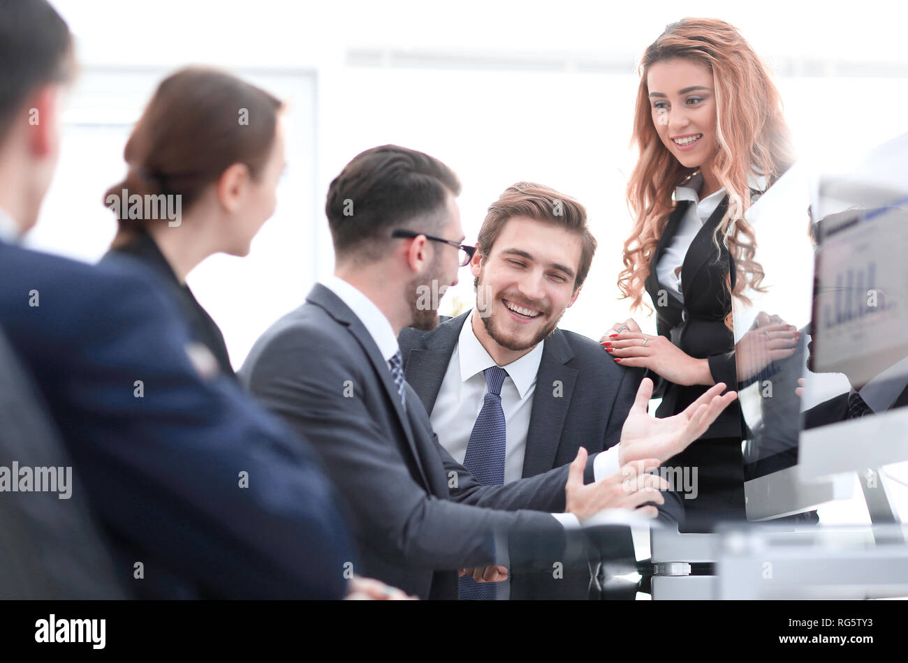 Company employees using business charts hi-res stock photography and ...