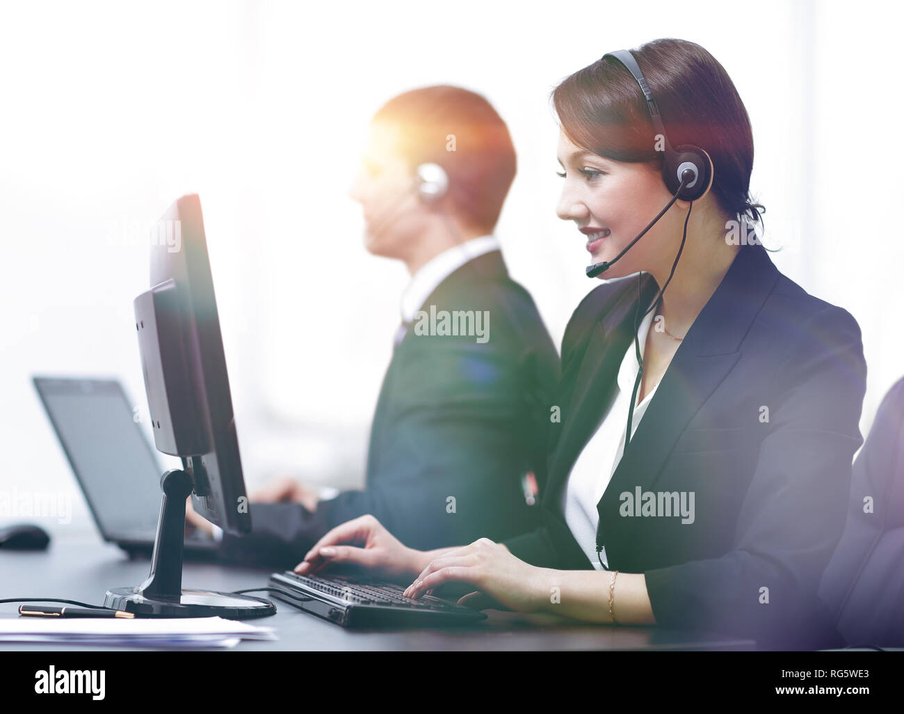 Working customer services helpdesk hi-res stock photography and images ...