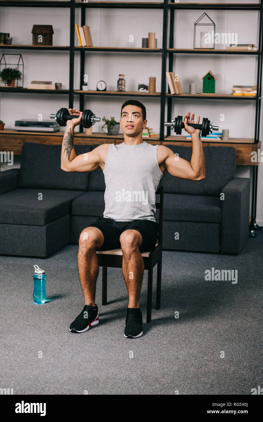 Gym exercise male home sitting chair hi-res stock photography and ...