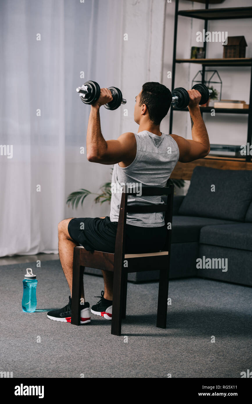 Gym exercise male home sitting chair hi-res stock photography and ...