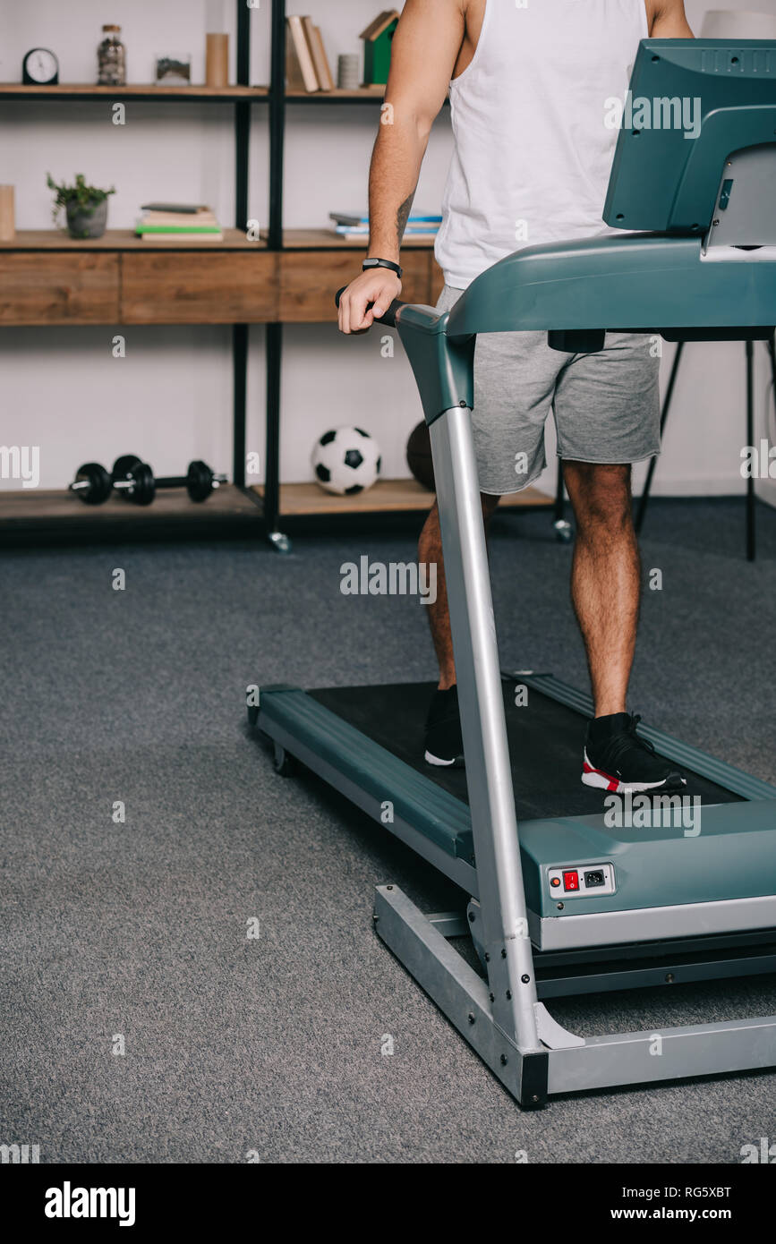 Male exercising on treadmill home hi-res stock photography and images ...