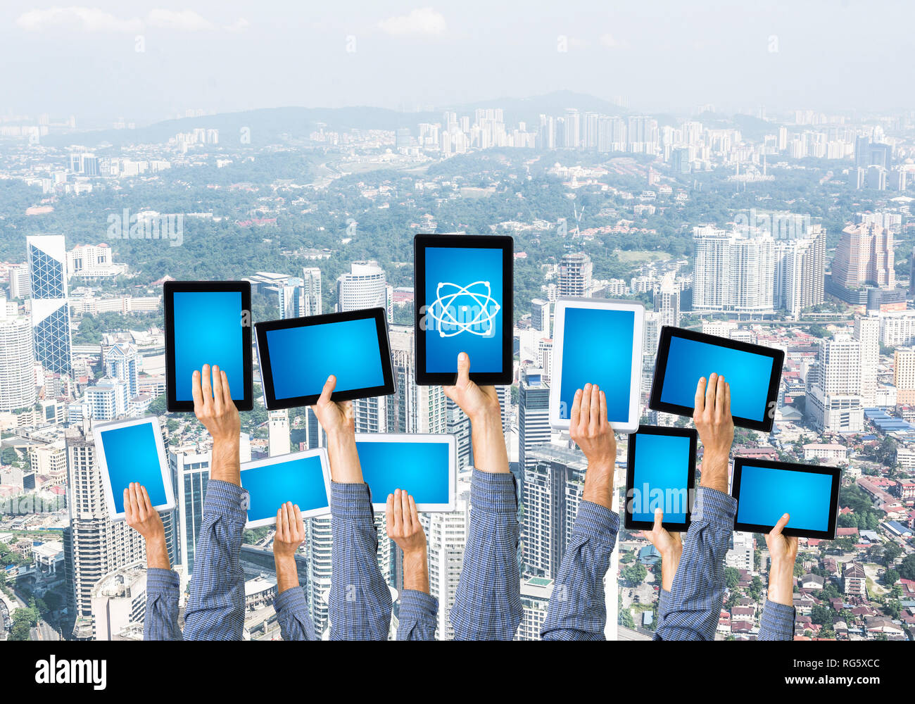 Close of man hands in line showing tablet pc with blank blue screen ...